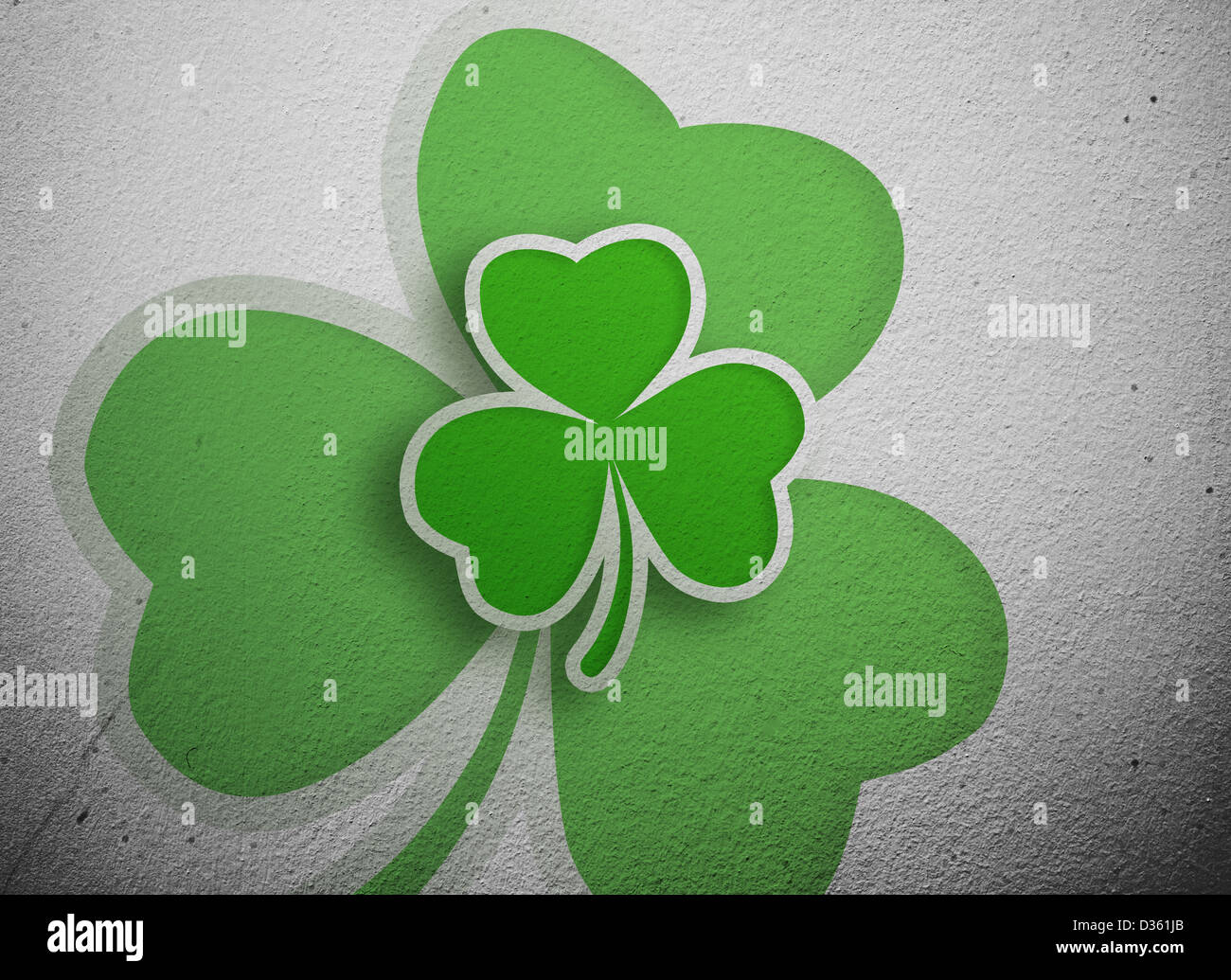 Shamrock design on grey wall Stock Photo - Alamy