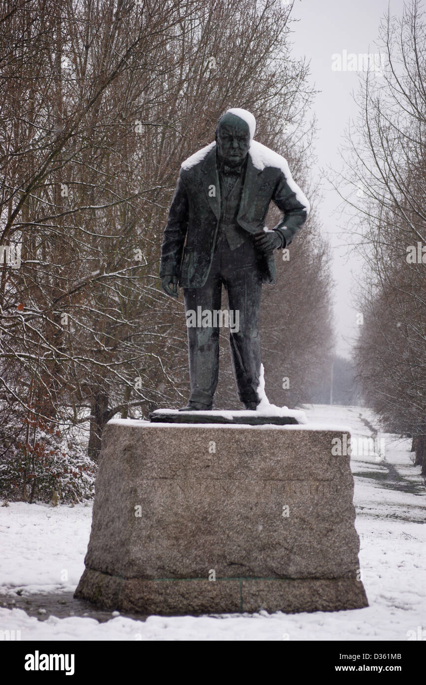 Overnight snow covers the 1959 statue by David McFall RA (1911-1988) of ...