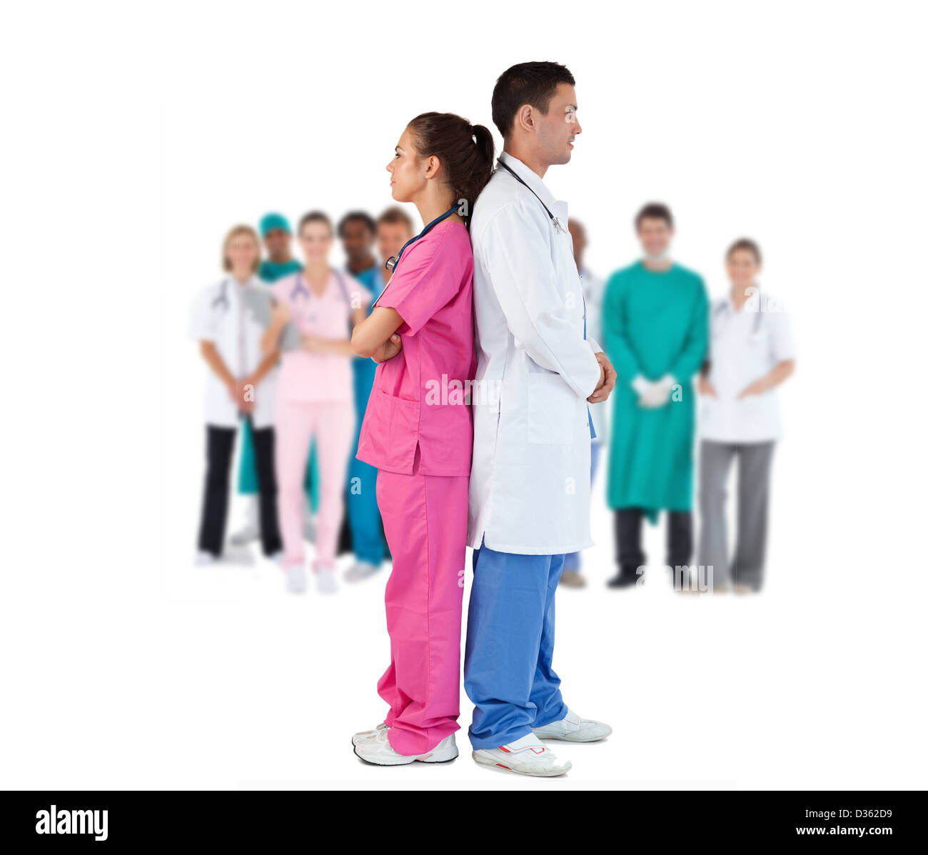 Doctor and nurse standing back to back Stock Photo - Alamy
