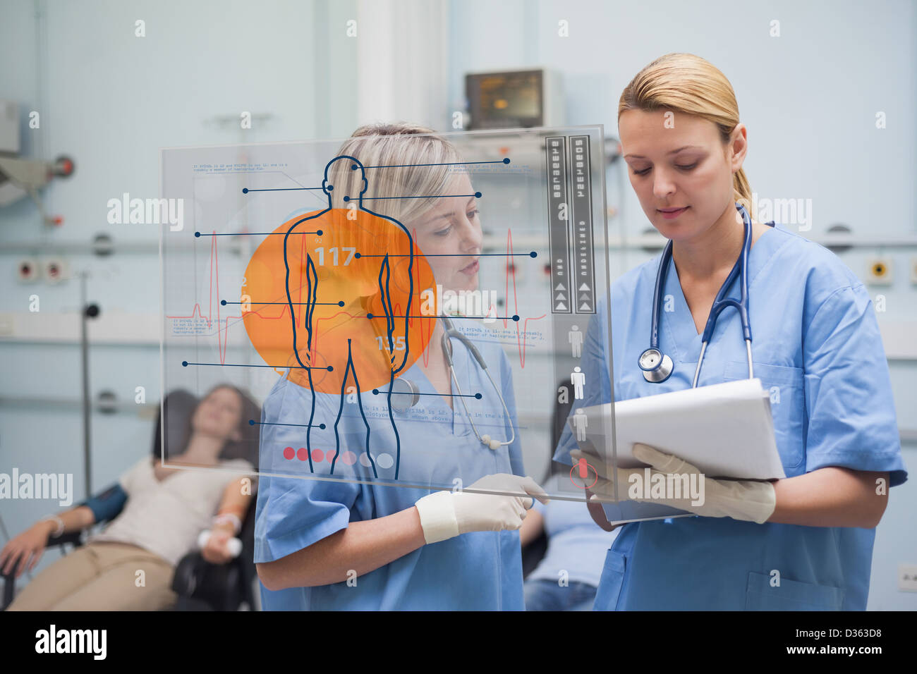 Nurses working on an interface Stock Photo - Alamy