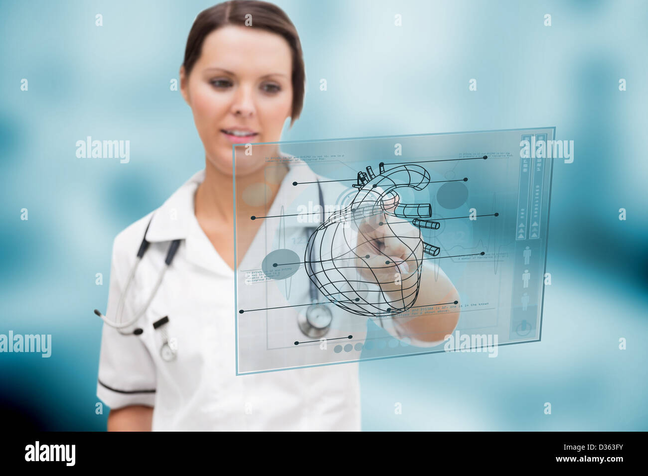 Serious nurse using a futuristic interface Stock Photo - Alamy