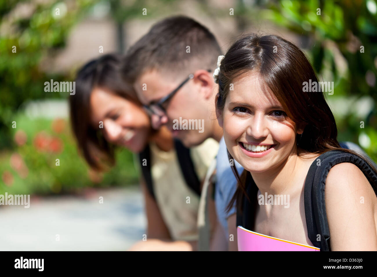 Outdoor portrait of a smiling student Stock Photo - Alamy