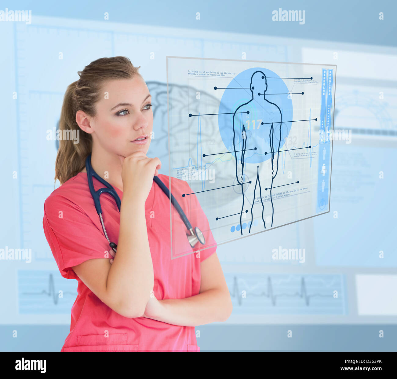 Nurse looking at a futuristic interface Stock Photo - Alamy