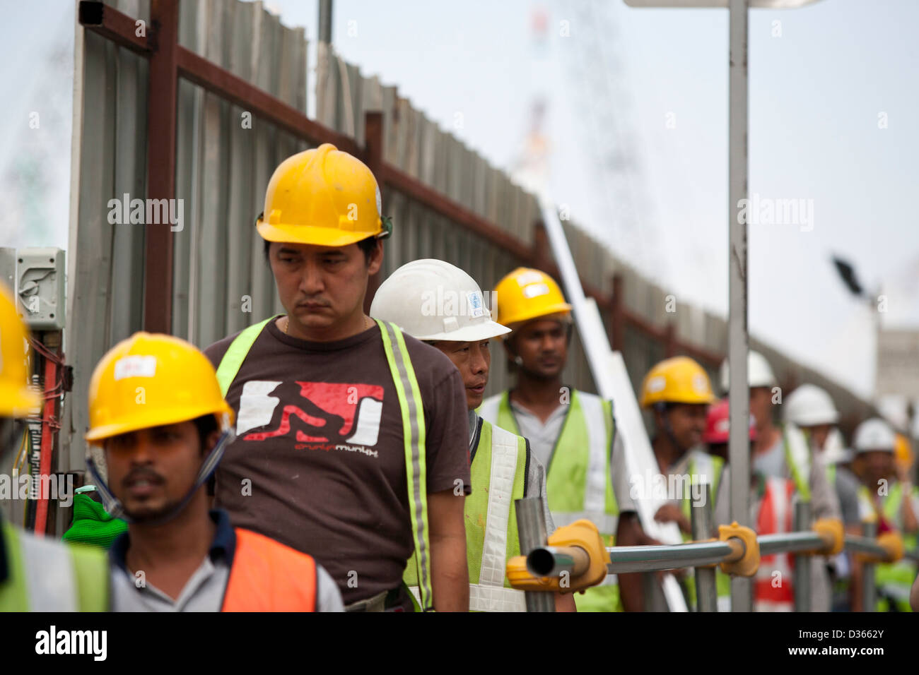 Migrant workers on the construction site of the Marina Bay Sands Resort ...