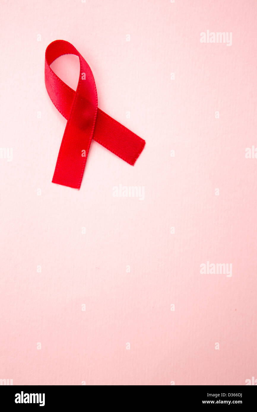 Red awareness ribbon for aids Stock Photo - Alamy