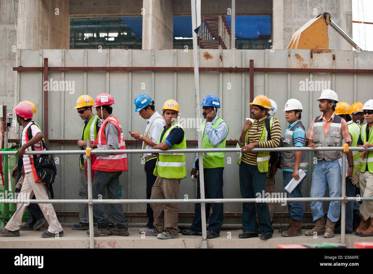 Migrant workers on the construction site of the Marina Bay Sands Resort ...