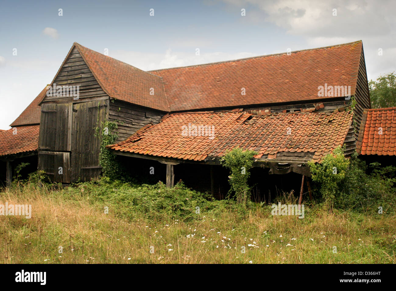 landscape photo of a derelict barn and farm building Stock Photo - Alamy
