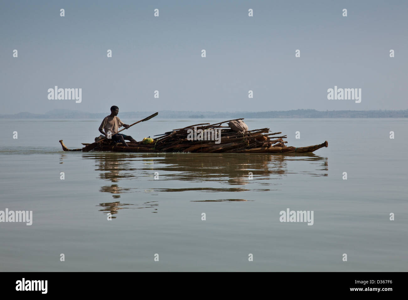 Local man transports wood across Lake Tana by Tankwa (Papyrus Boat ...