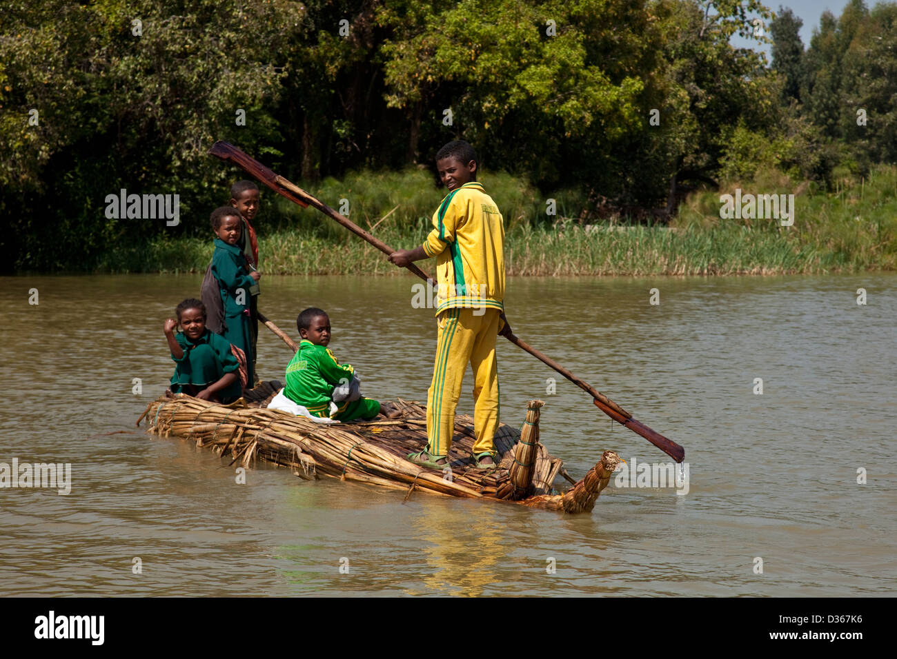 African children rowing on lake hi-res stock photography and images - Alamy