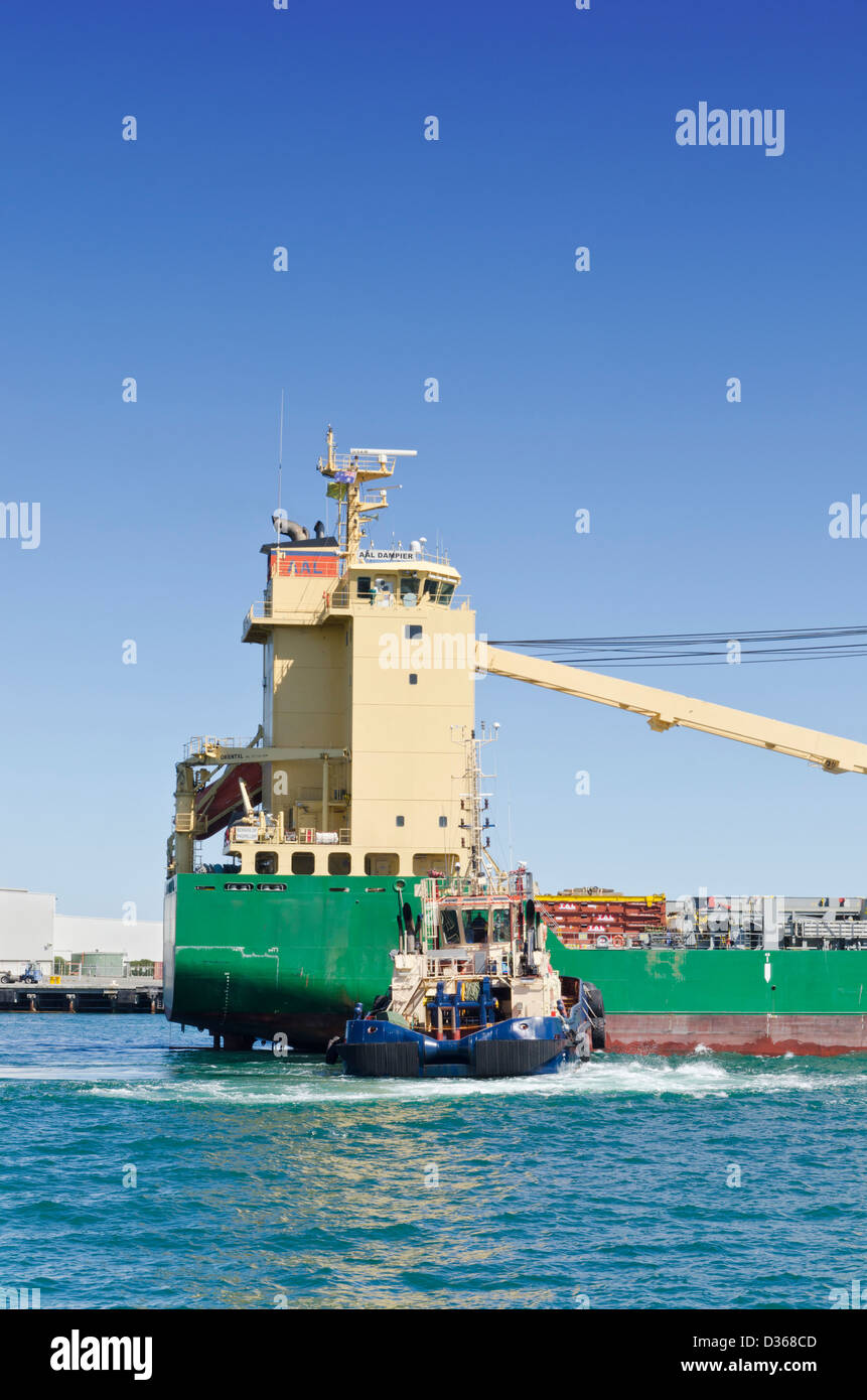 The Multi-Purpose Heavy-Lift Ship AAL Dampier, is assisted into dock at ...
