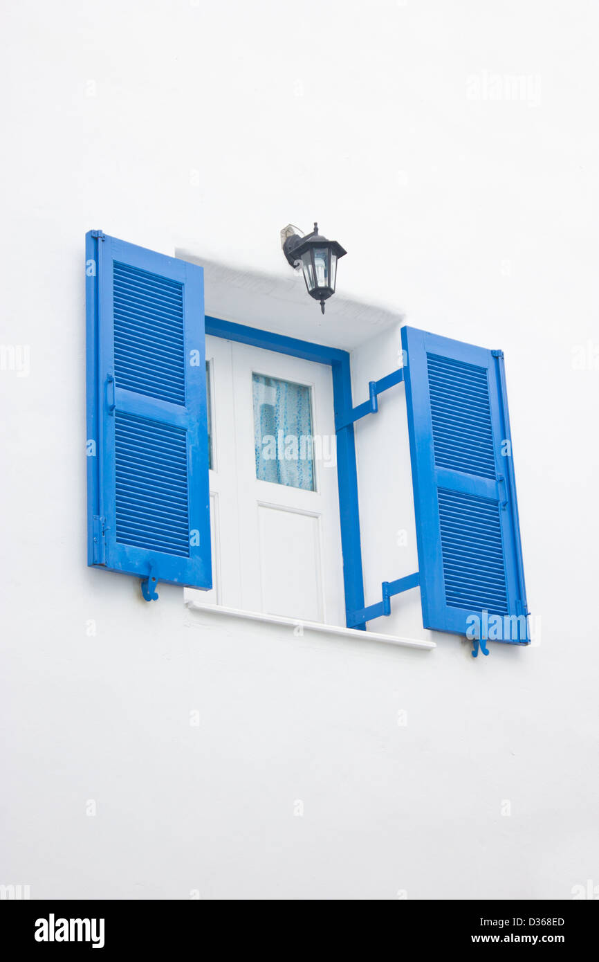 Blue open window with white wall Stock Photo - Alamy