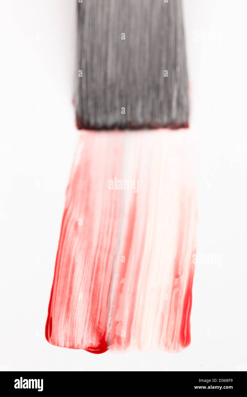 Paintbrush with red brush stroke Stock Photo - Alamy