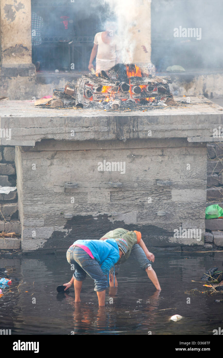 A Hindu cremation ceremony at Pashupatinath Temple, a Hindu temple of ...