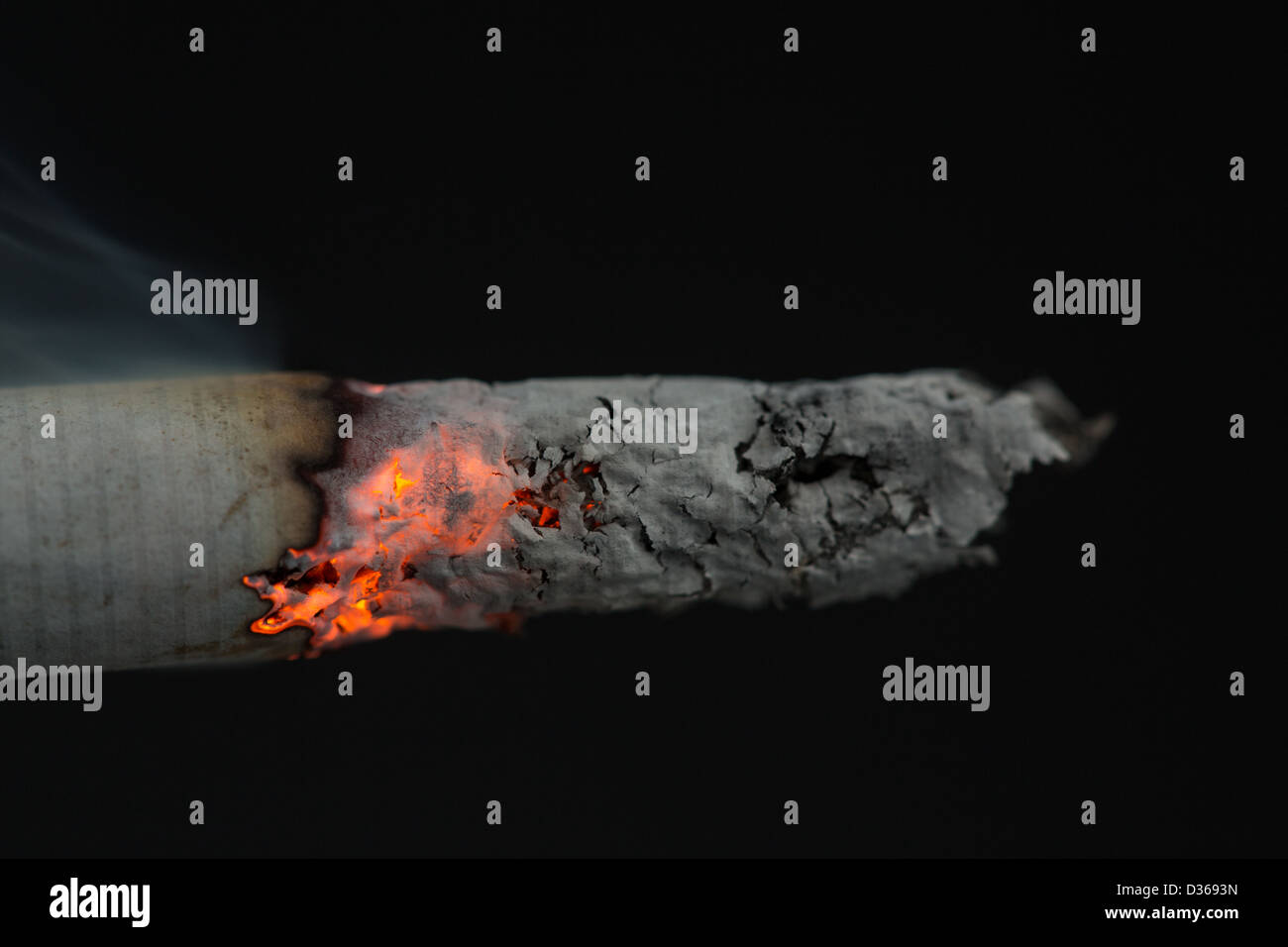 Close up of burning cigarette Stock Photo - Alamy
