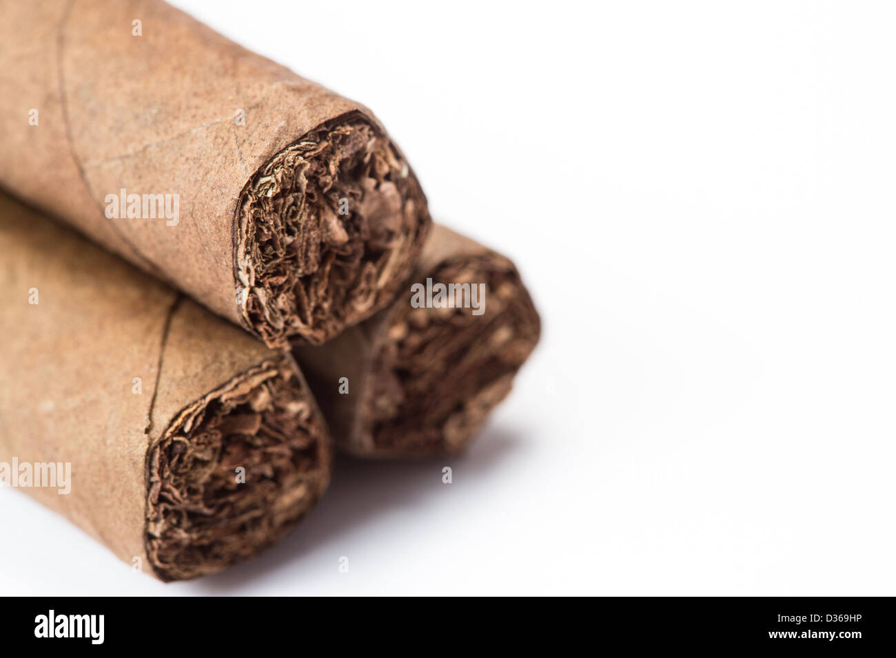 Three cigars stacked Stock Photo - Alamy
