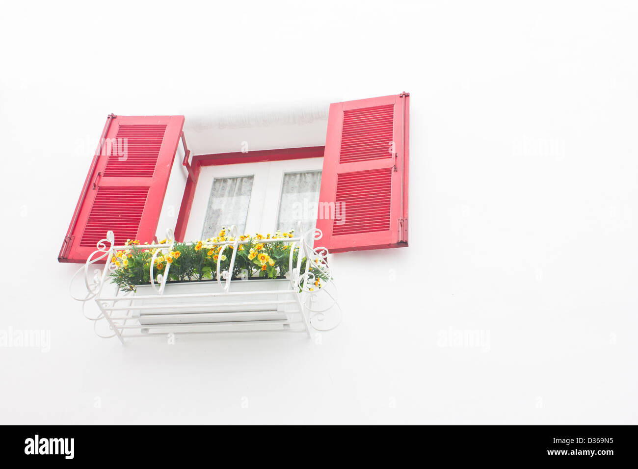 Opened red window with white wall Stock Photo - Alamy