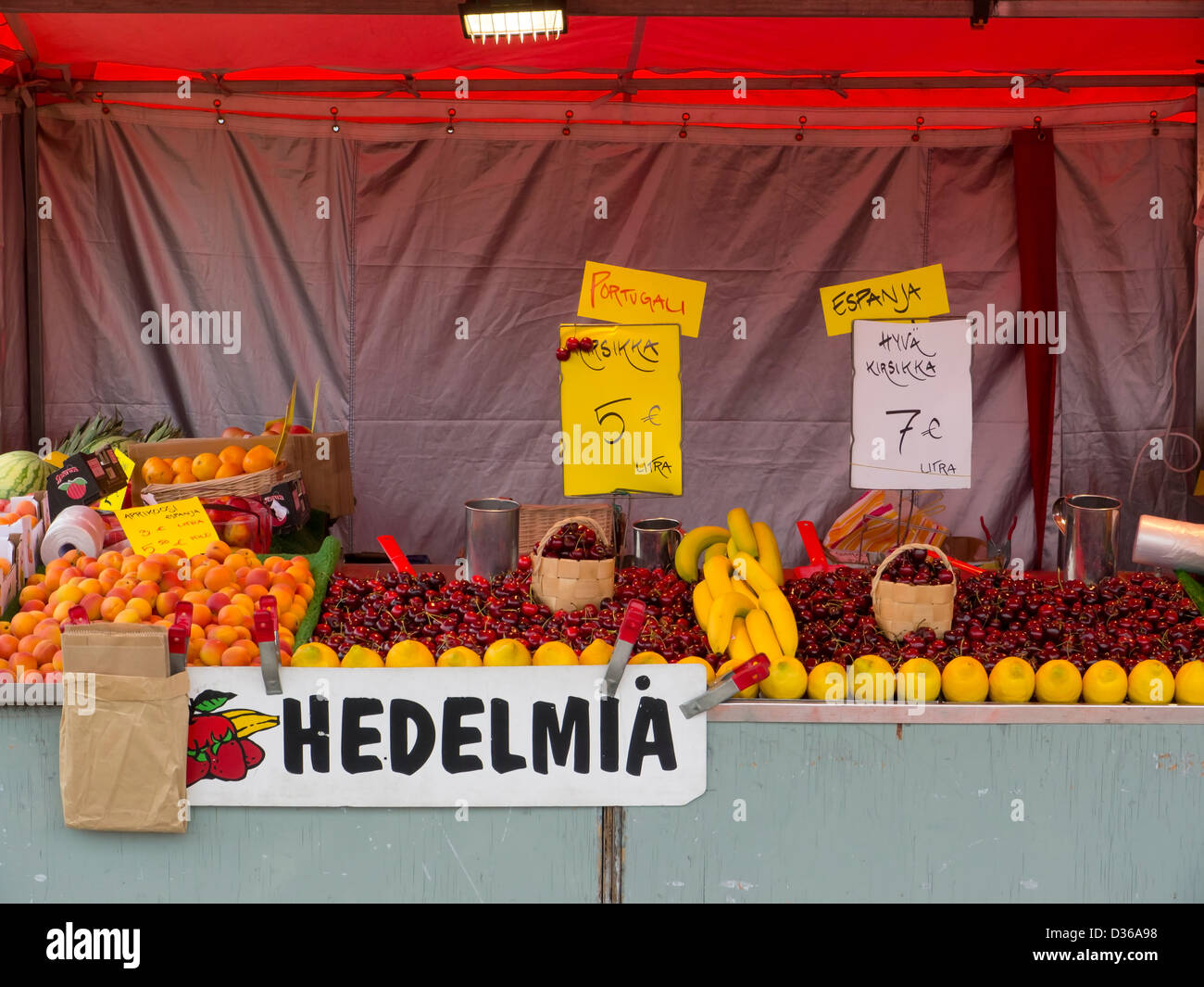 Local fruits and berries for sale on a market stall in Helsinki ...