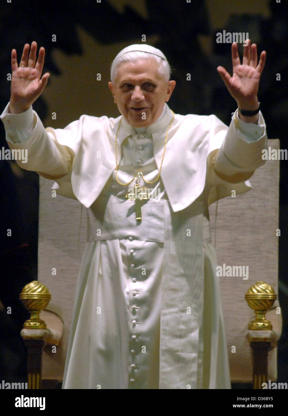 (dpa) - Pope Benedict XVI stands in front of a microphone and gestures ...