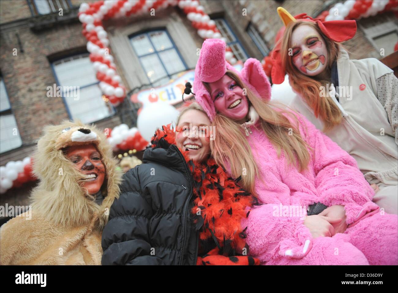 People wearing costumes take part in the carnival parade in Duesseldorf ...