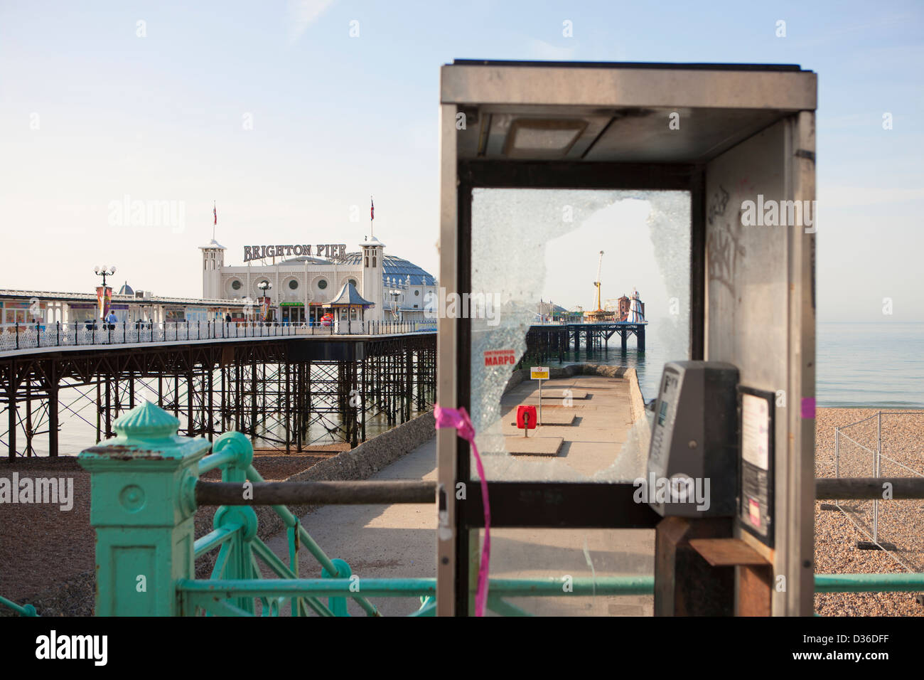 Vandelised phone box and Brighton Pier, Brighton, Sussex, England Stock ...