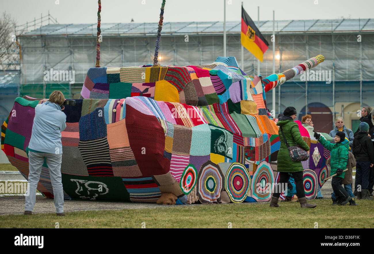 A tank covered with knitwear sits in front of the Military Historical ...