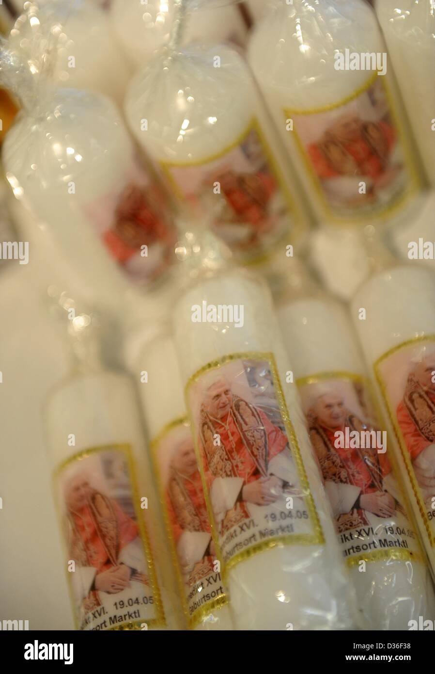 Candles are on sale with portraits of Pope Benedict XVI at the office ...