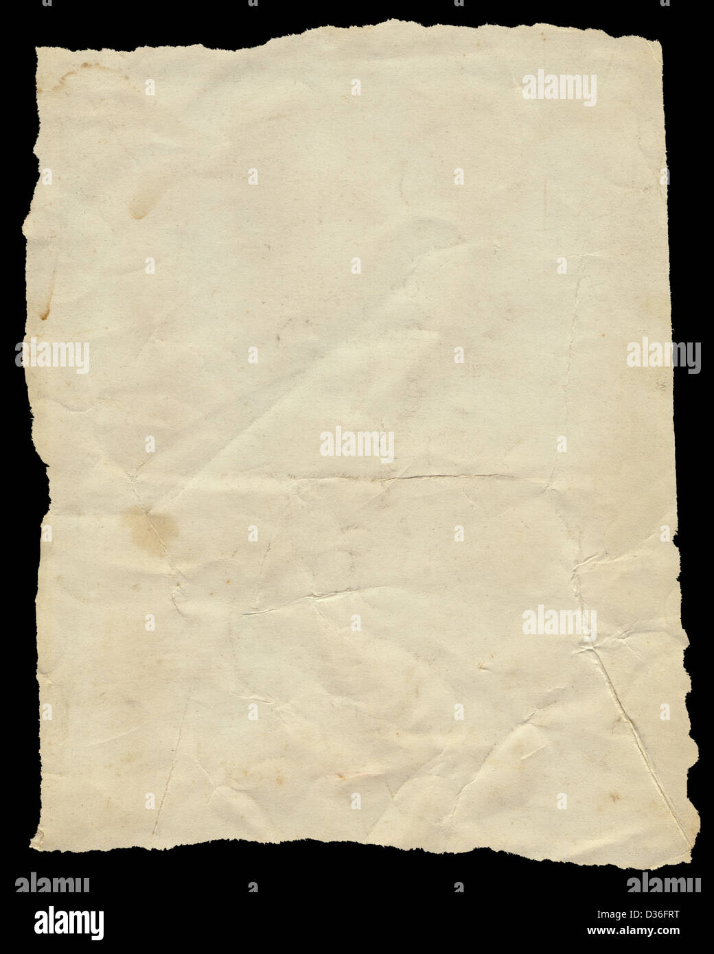 Old vintage torn creased paper isolated on black Stock Photo - Alamy