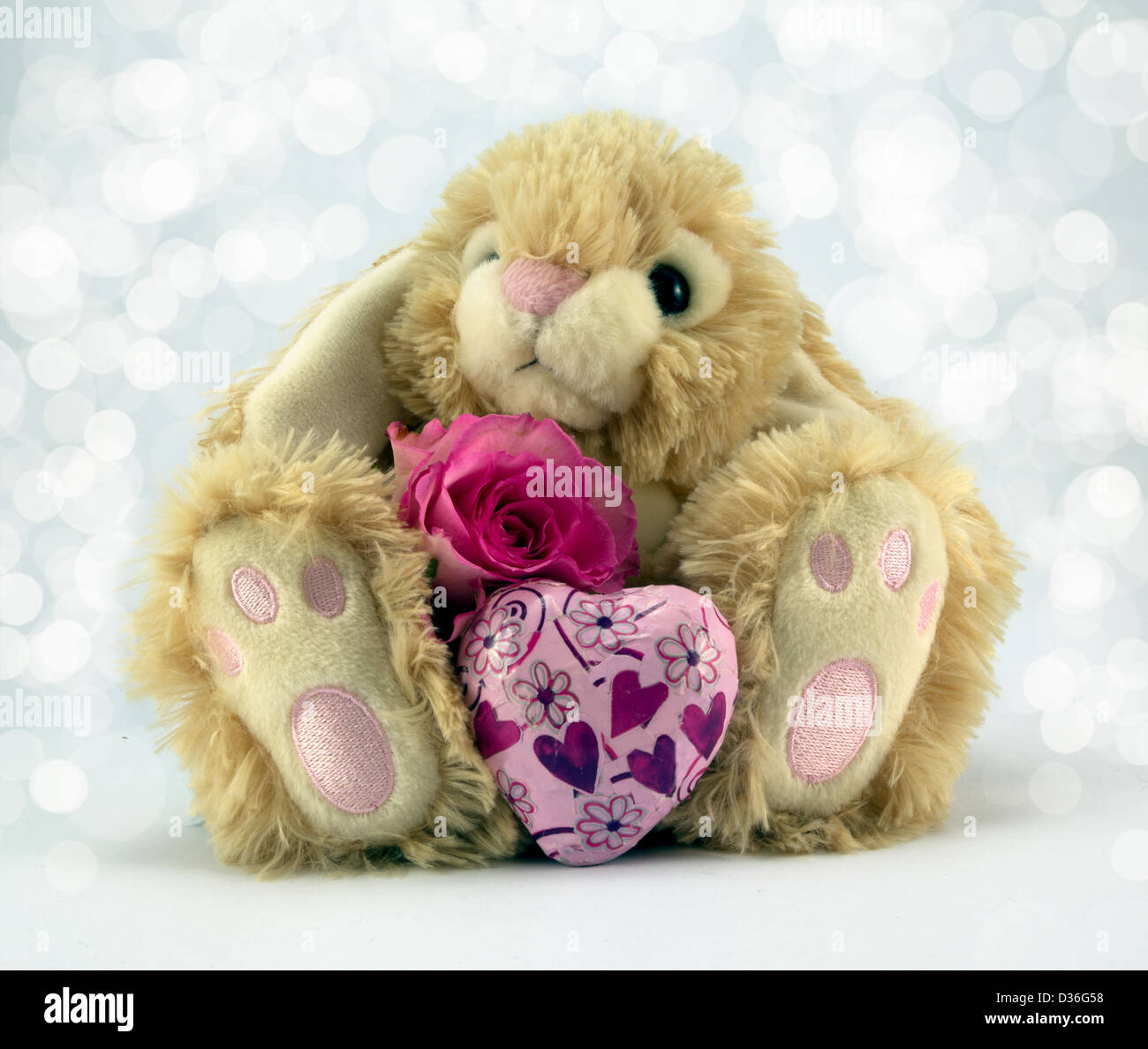 Cute bunny with pink rose and love heart Stock Photo - Alamy