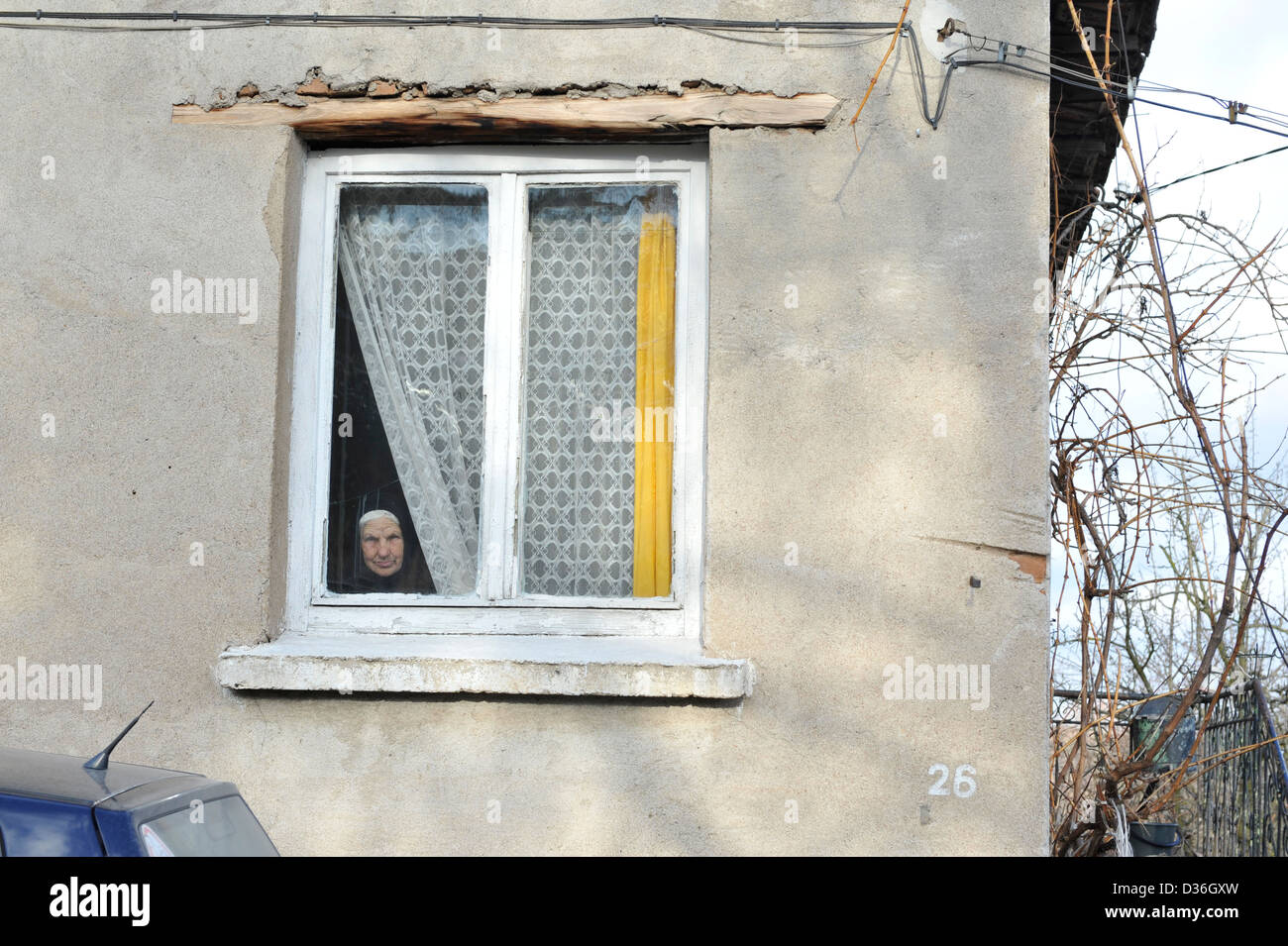 old lady in the window Stock Photo - Alamy