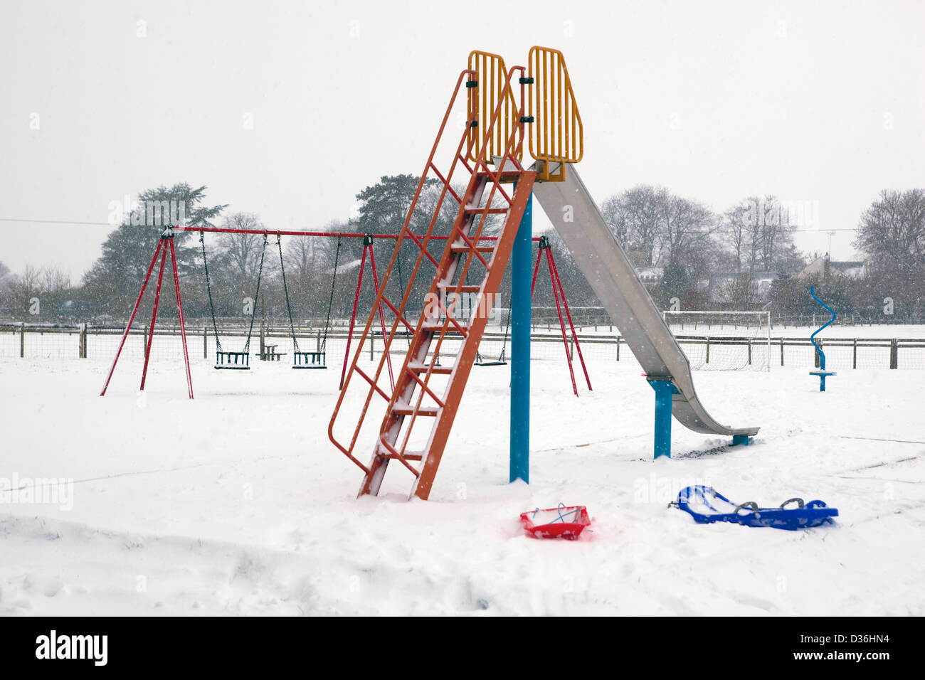 Childrens Playground in the snow Stock Photo - Alamy