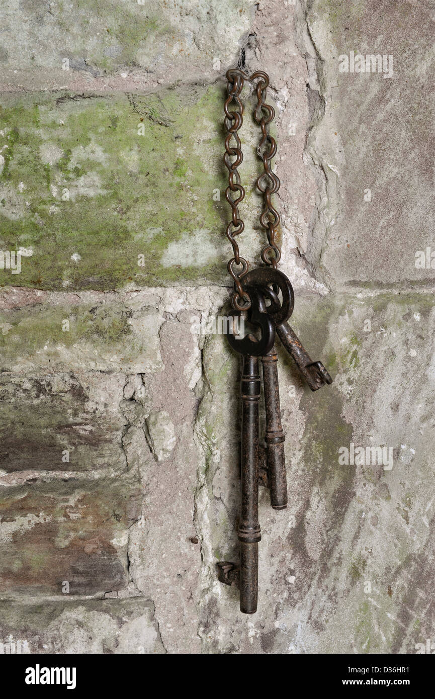 Keys hanging on stone wall hi-res stock photography and images - Alamy