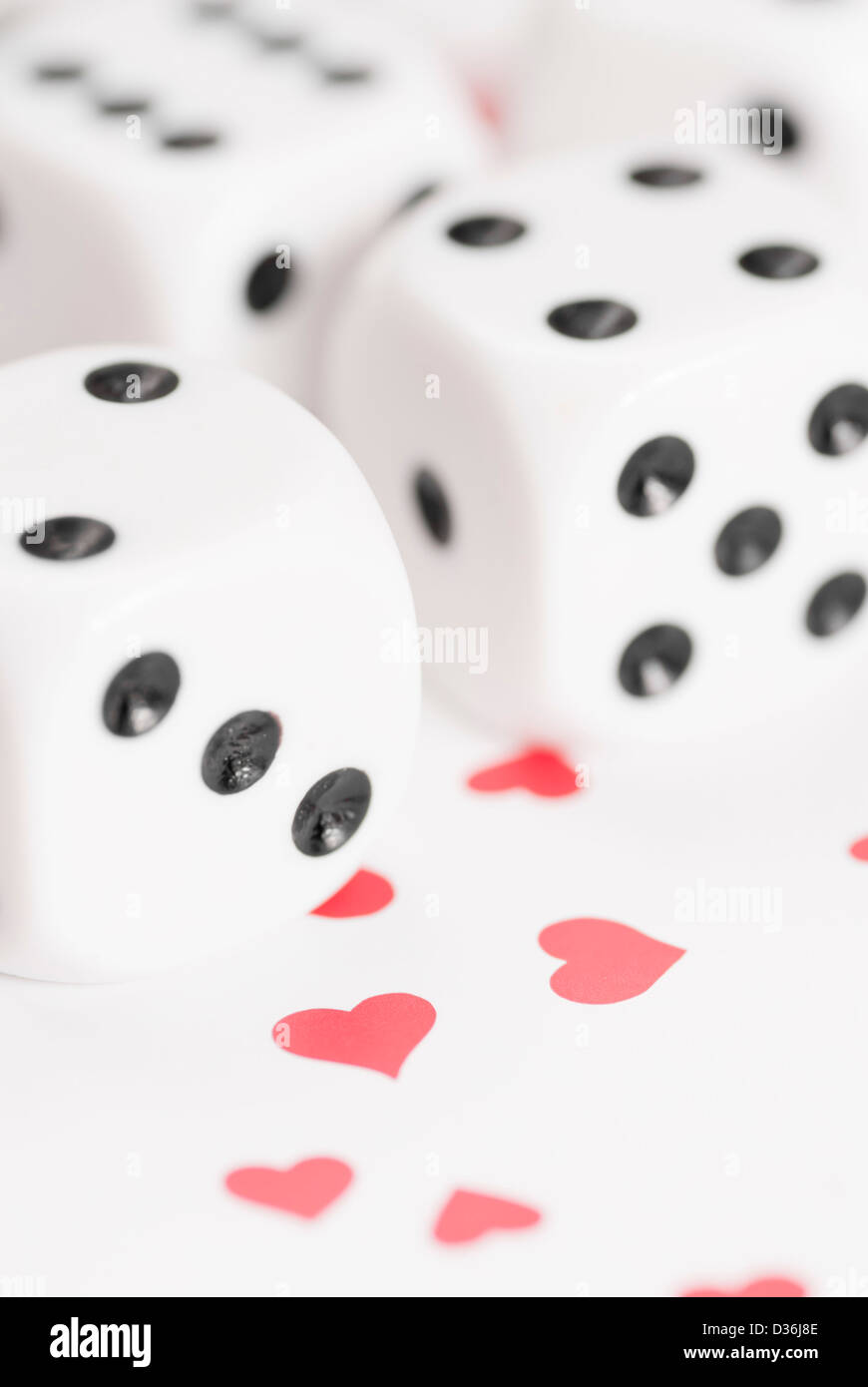Macro image of dice on love heart background Stock Photo - Alamy
