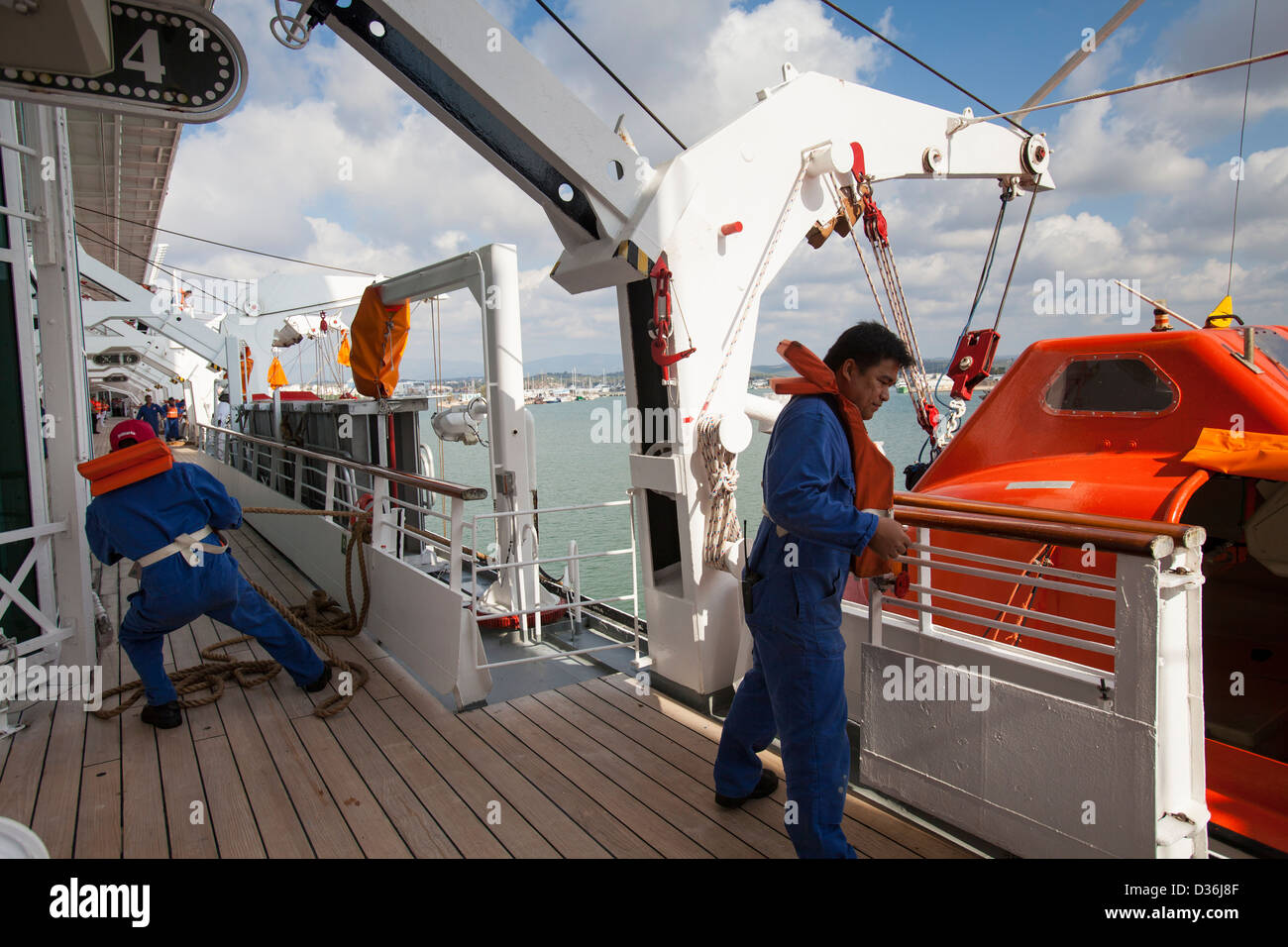 Cruise ship crew lifeboat drill hi-res stock photography and images - Alamy