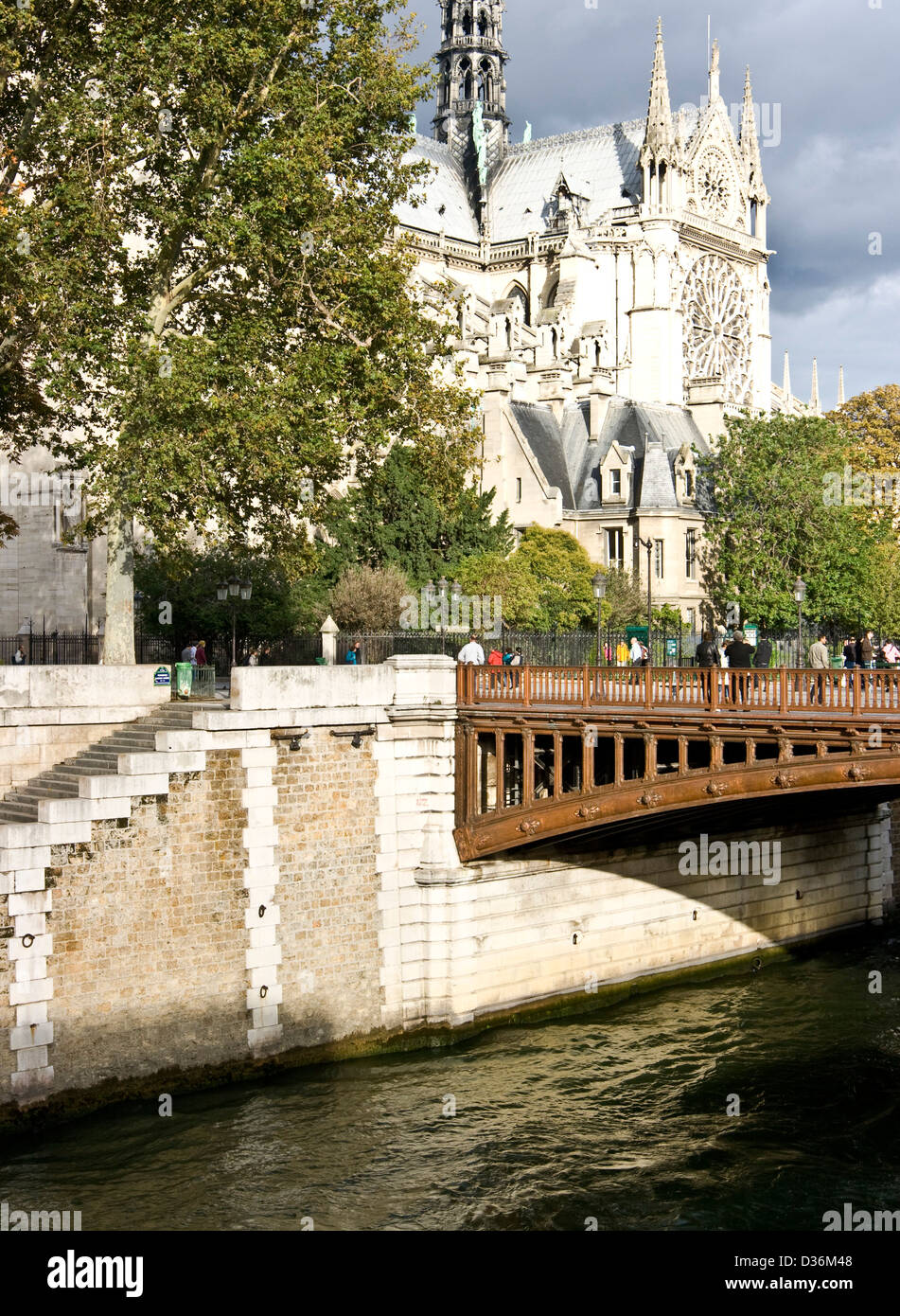 Pont au Double river Seine Notre Dame Cathedral at dusk Paris France ...