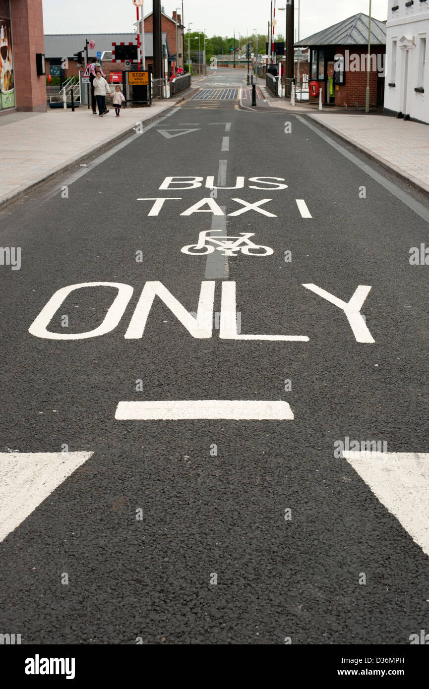 Bus Taxi and Bicycle Lane Only road markings Stock Photo - Alamy