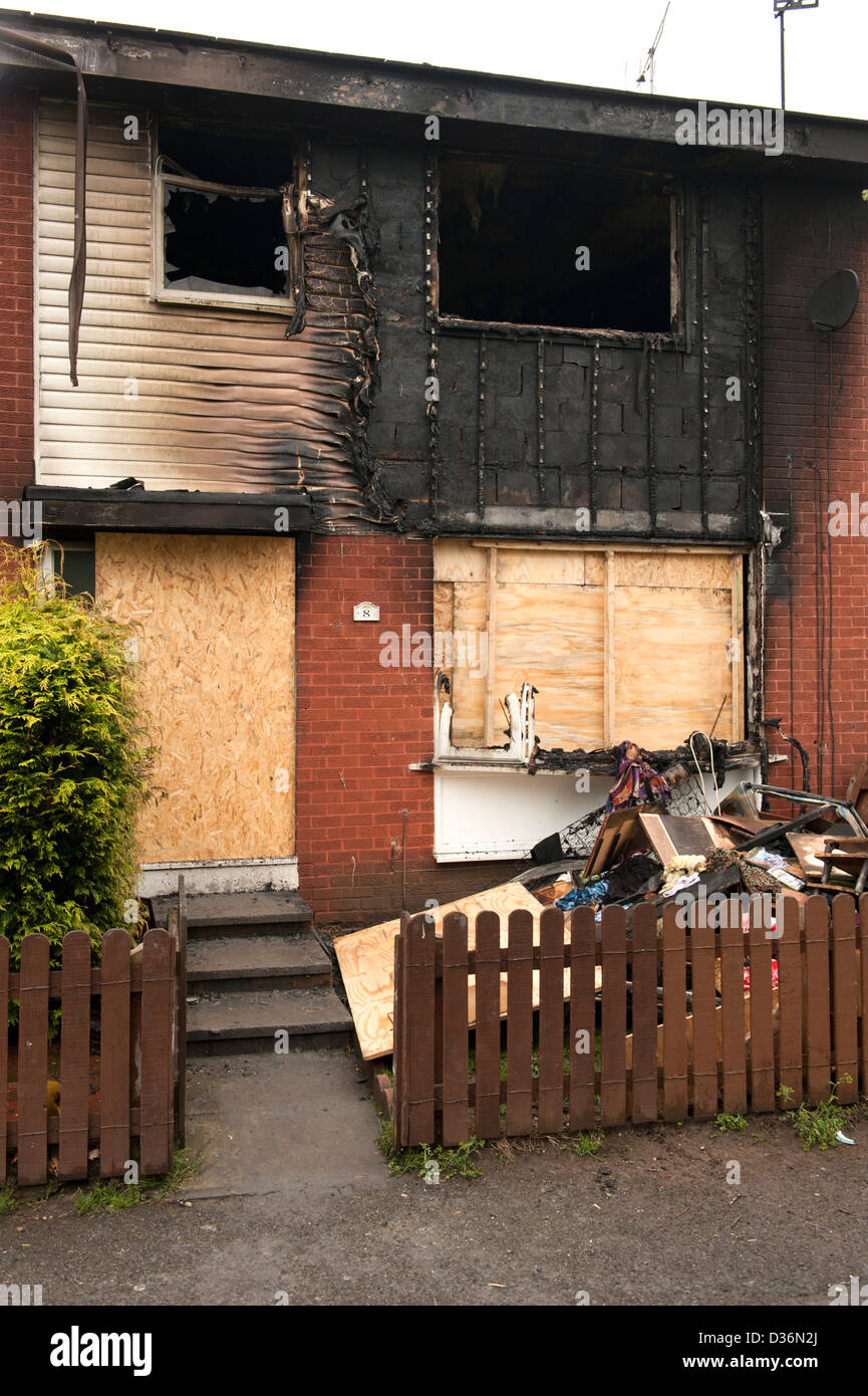 Severe house bedroom fire rescue burnt out Stock Photo - Alamy