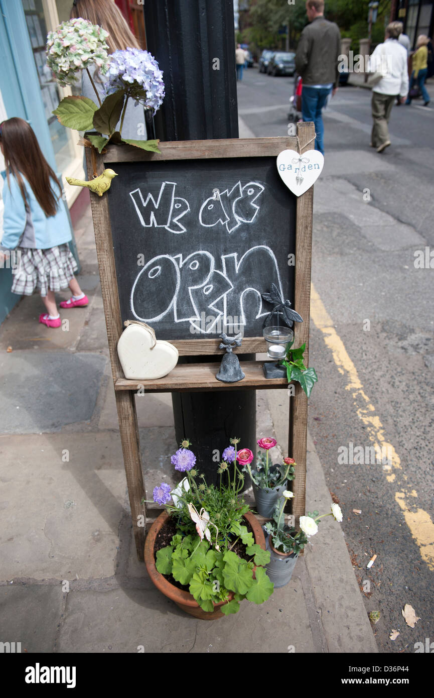 We Are Open sign flowers flowery shop chalk Stock Photo - Alamy