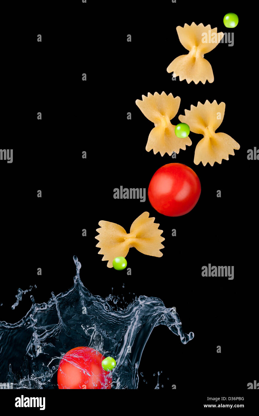 Pasta Splashing In Water Stock Photo - Alamy