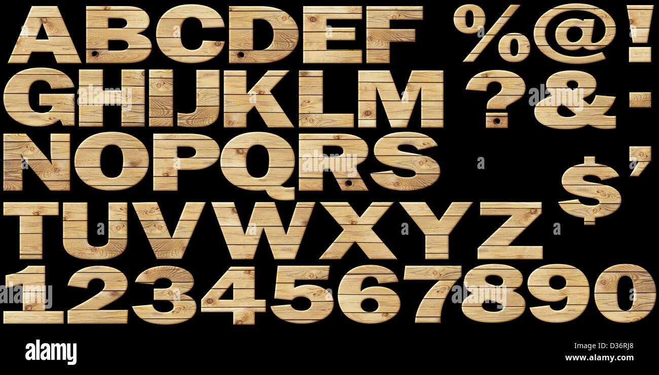 Wooden alphabet on a black background - a set Stock Photo - Alamy