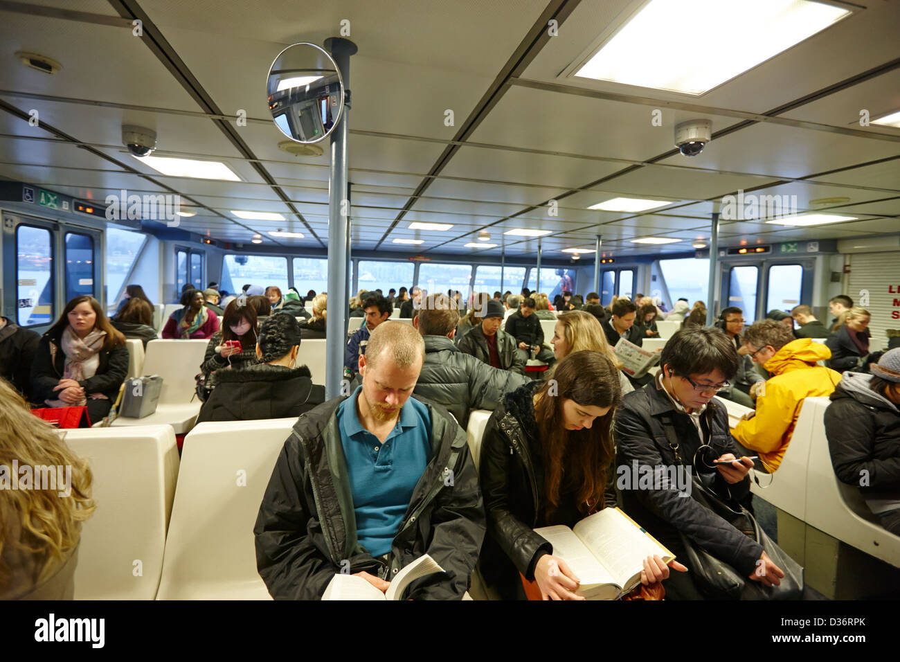 Passengers on seabus crossing vancouver hi-res stock photography and ...