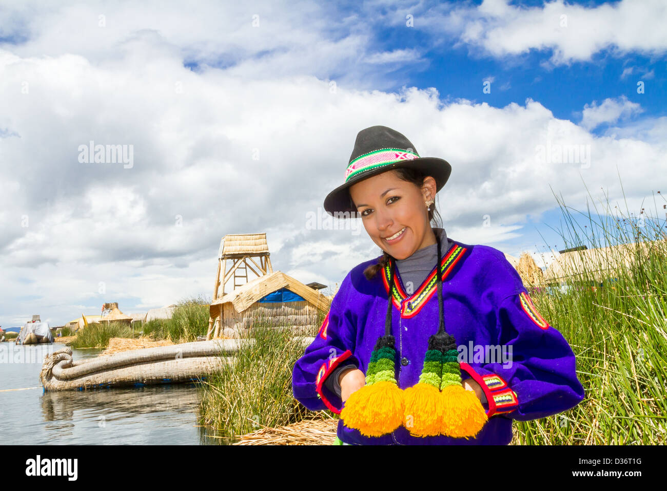 Woman in traditional indigenous clothing, Peru Stock Photo - Alamy