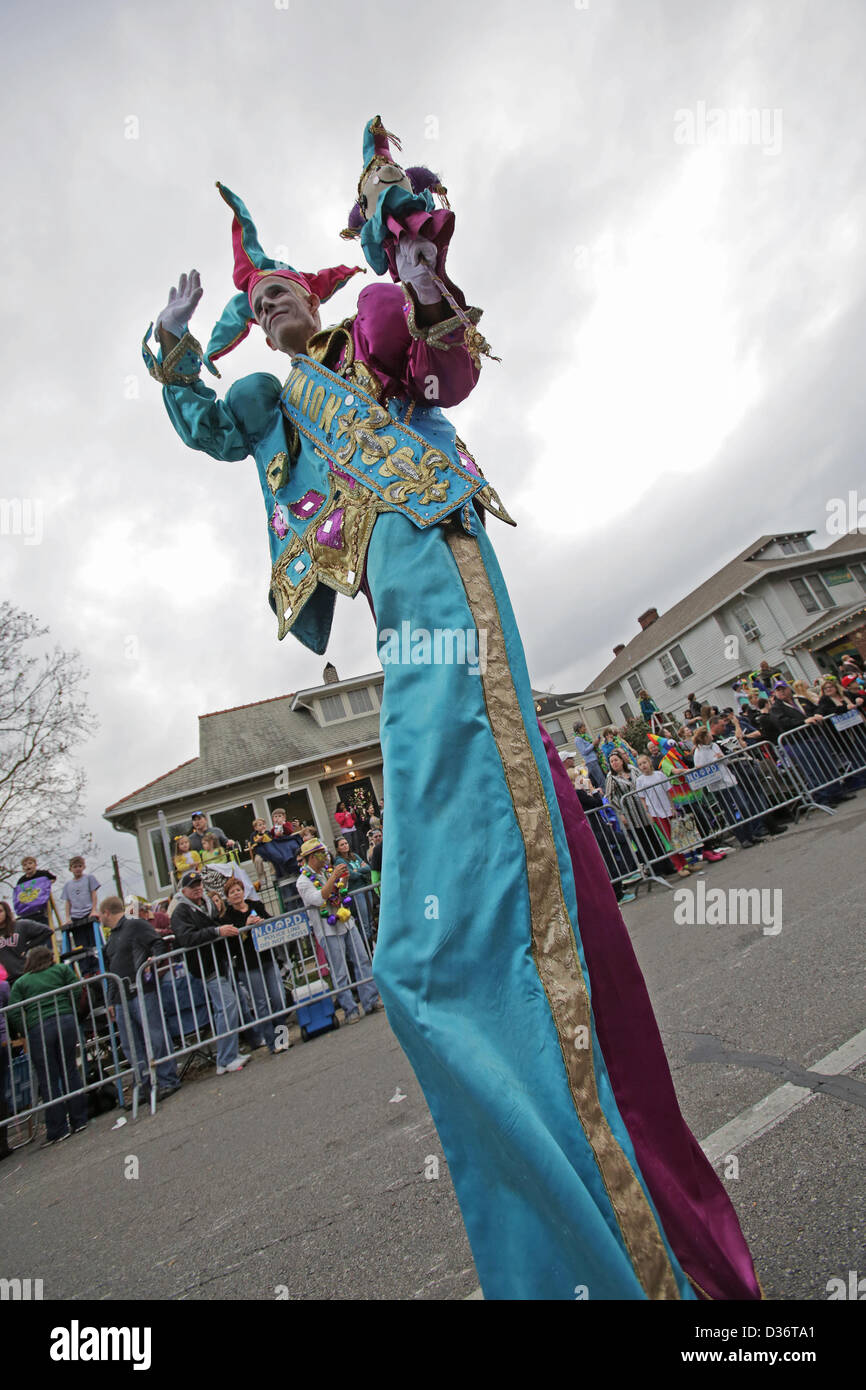 Feb. 9, 2013 - New Orleans, LOUISIANA, US - A jester on stilts waves to ...