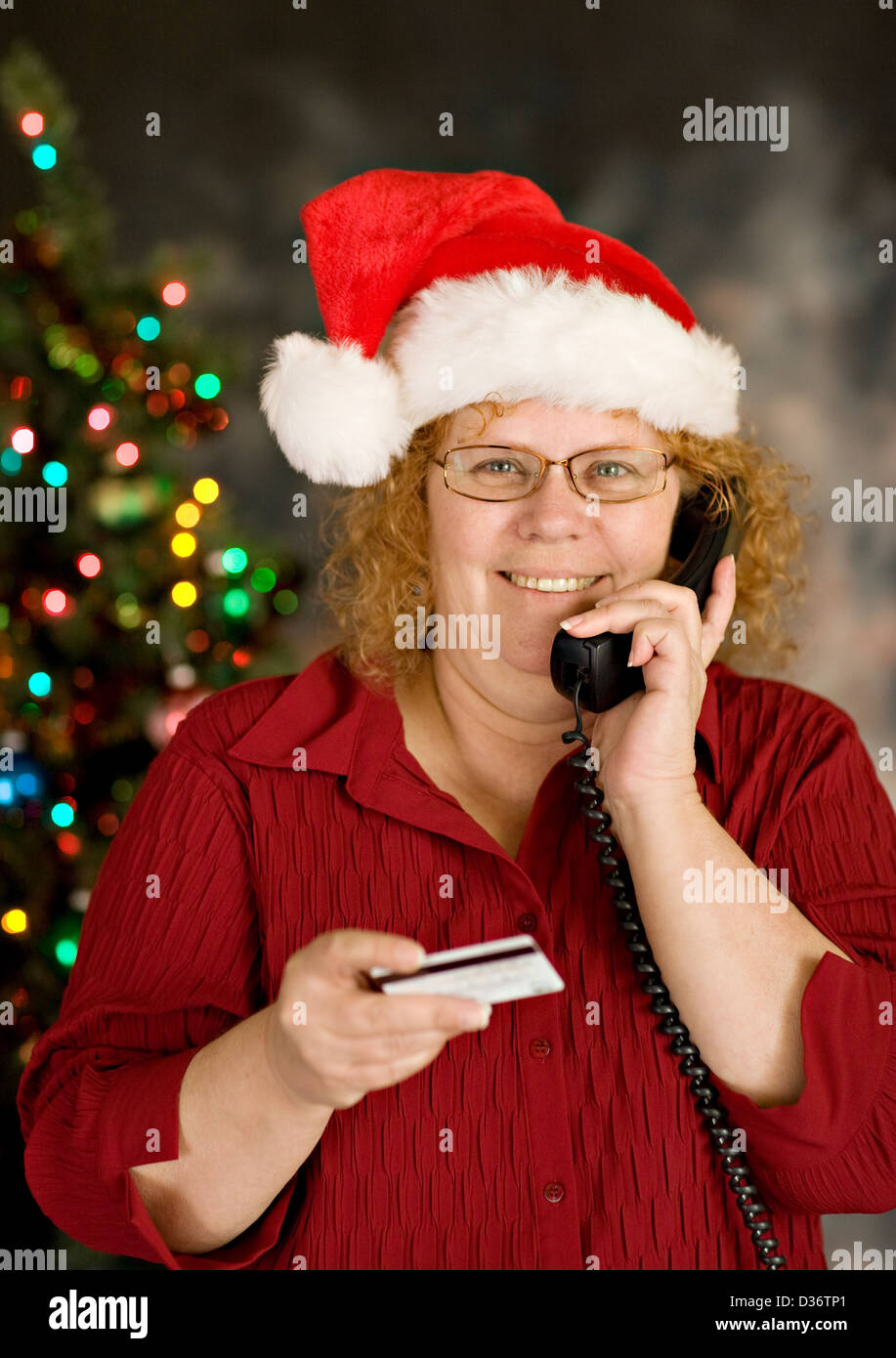 A grandma ordering holiday gifts over phone Stock Photo - Alamy