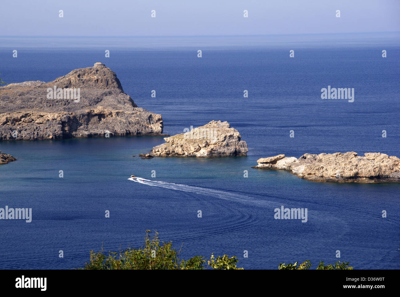 motorboat in a bay, Greece,Rhodes,Lindos Stock Photo - Alamy
