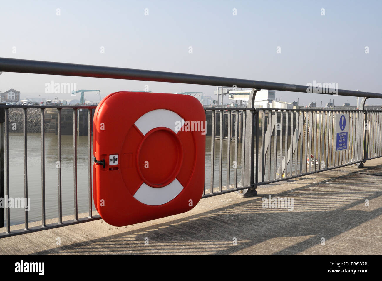 Life belt container on Cardiff Bay barrage Wales, Welsh coastline ...