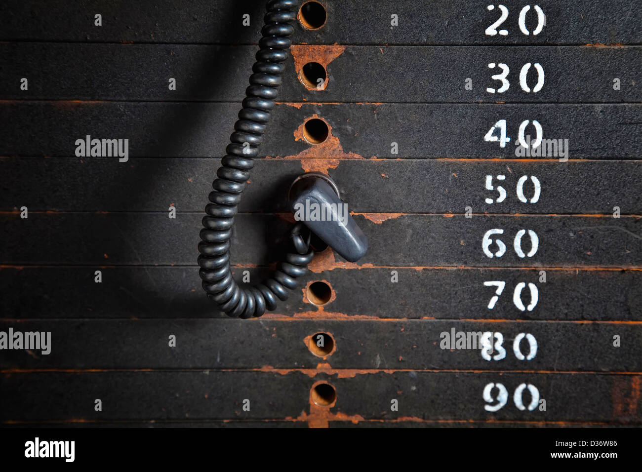 Old rusty weight stack in a gym Stock Photo - Alamy