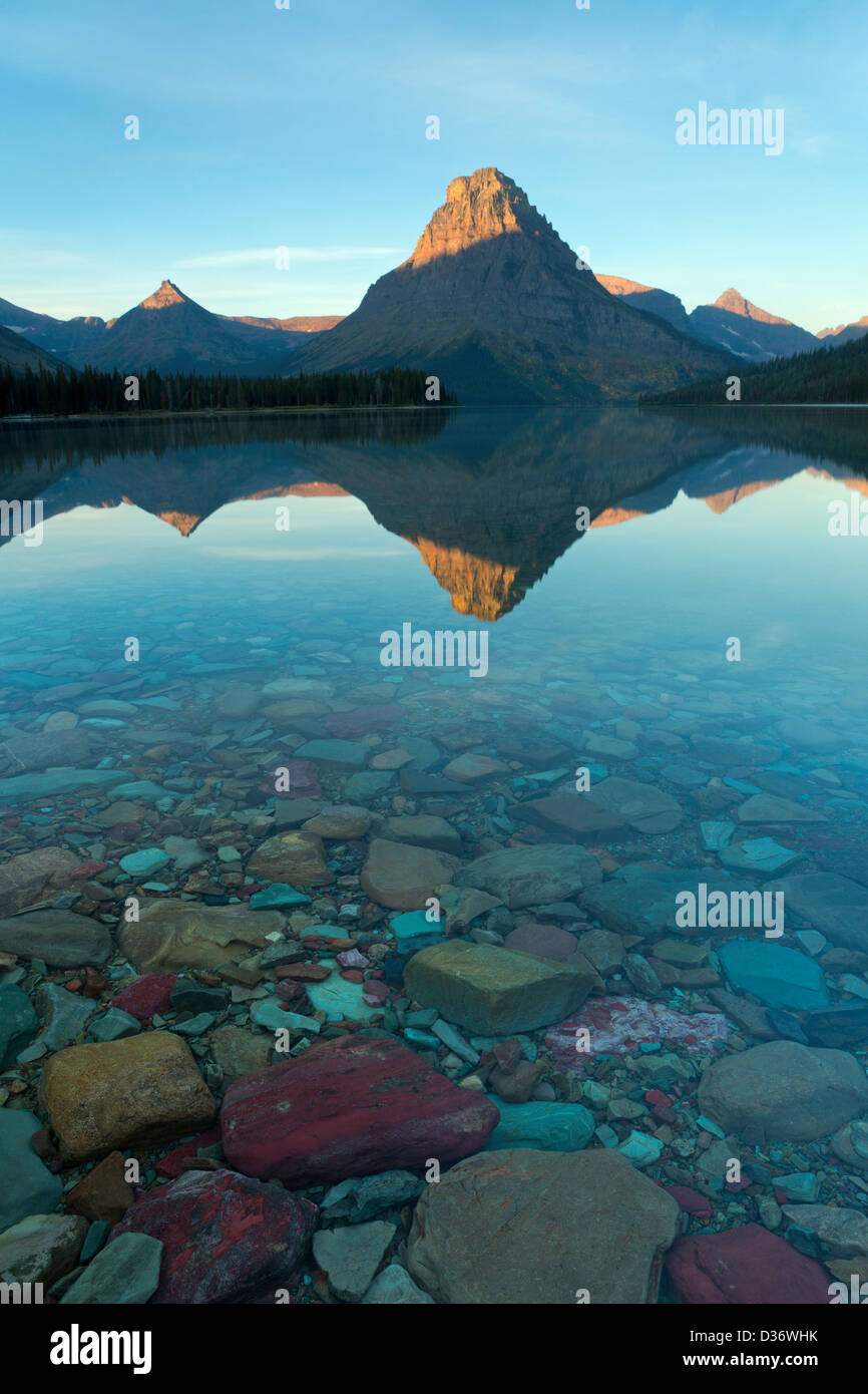 Two Medicine Lake at sunrise in the fall at Glacier National Park ...