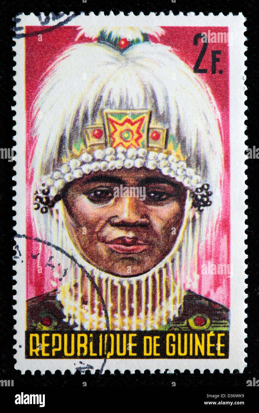 Masked dancer, postage stamp, Guinea, 1965 Stock Photo - Alamy