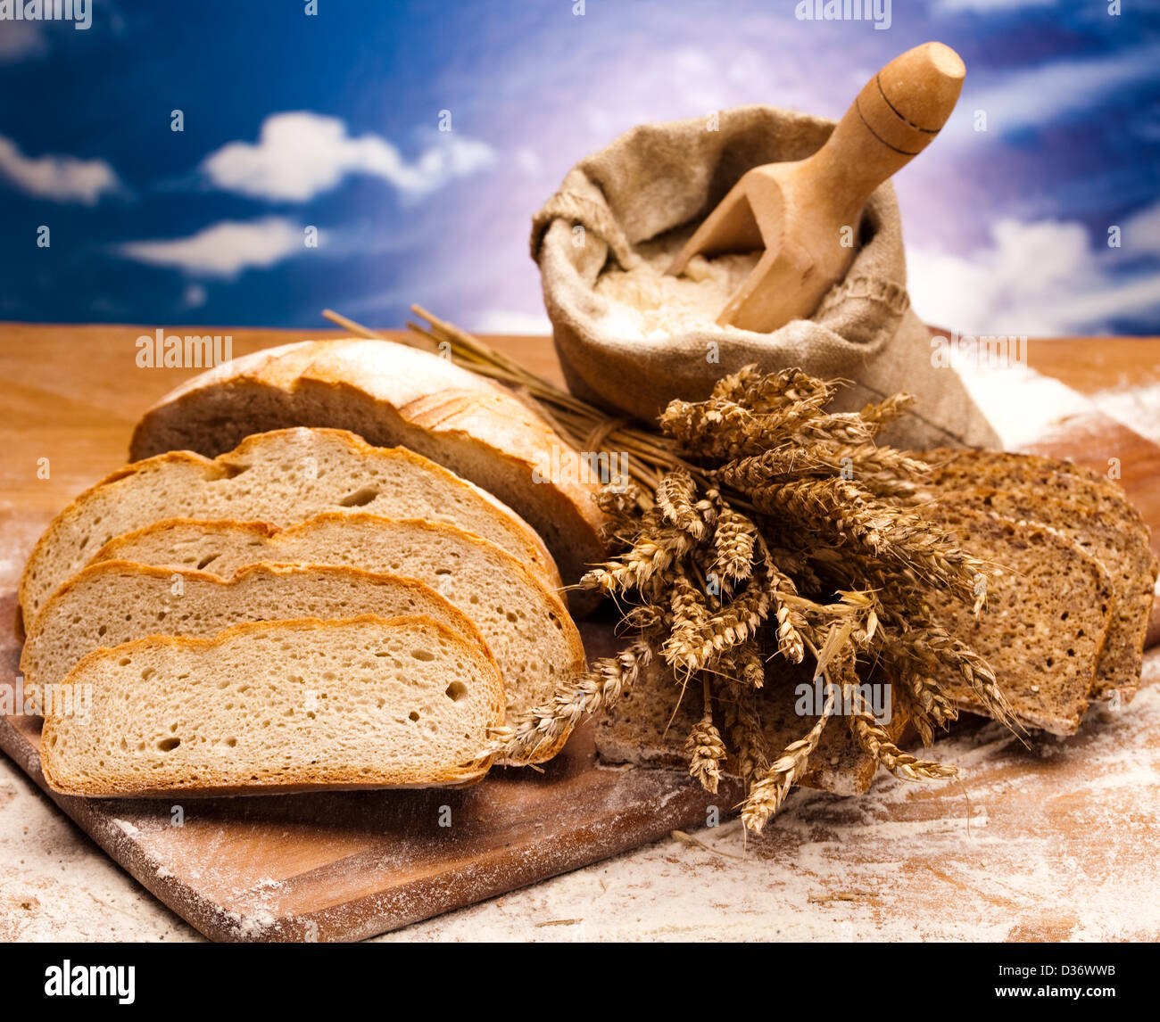 Variety of bread on blue sky background Stock Photo - Alamy