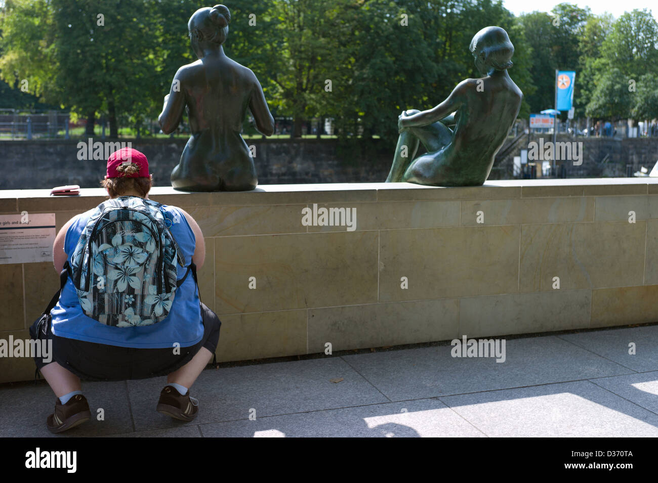 Berlin, Germany, by overweight man at the statues at the riverside when ...